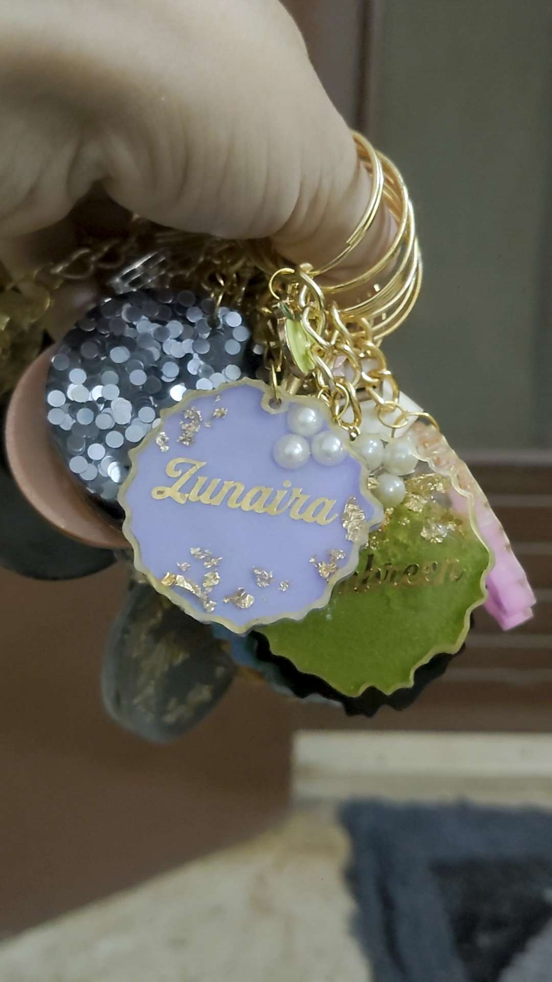 Handmade resin circular keychain with custom names and colors | Daraz.pk
